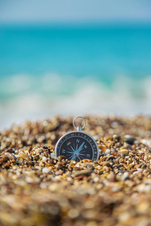 Compass on the Sea Beach. Selective Focus Stock Image - Image of ...