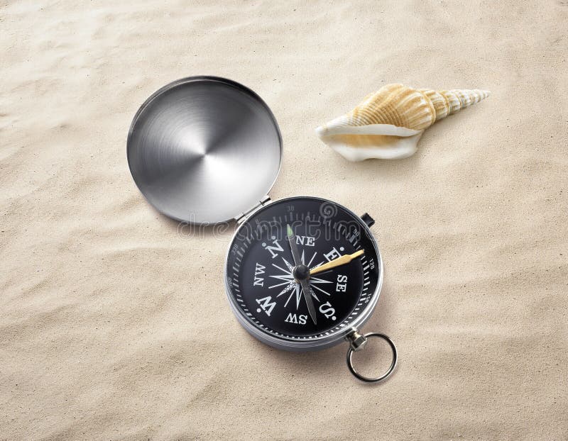 Compass on Sea Sand. Travel Destination and Navigation Concept Stock ...