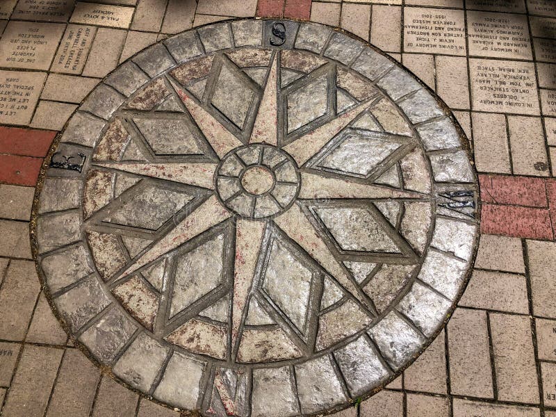 Compass Design on Brick Pavement Stock Image - Image of pavement ...