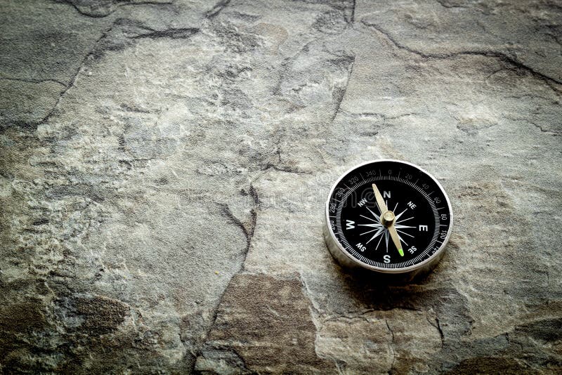 Compass and small atlas stock photo. Image of travel, world - 4817848