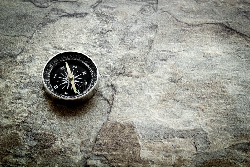 Compass and small atlas stock photo. Image of travel, world - 4817848