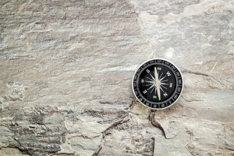 Compass - Small and Stylish - on Grey Background Top View Copy Space ...