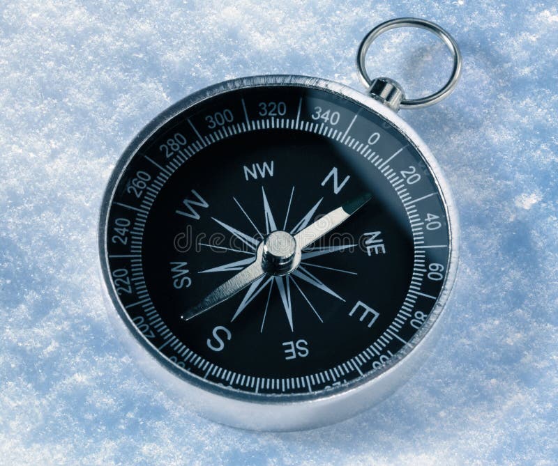 Compass on snow stock photo. Image of research, magnetic - 36082348