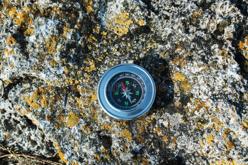 Compass on stone stock photo. Image of compass, nature - 214942038