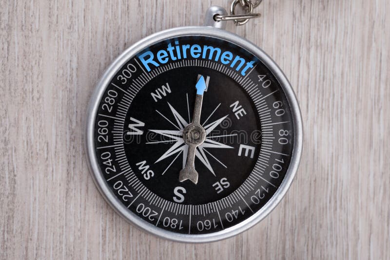Compass on Table Indicating Retirement Word Stock Image - Image of ...