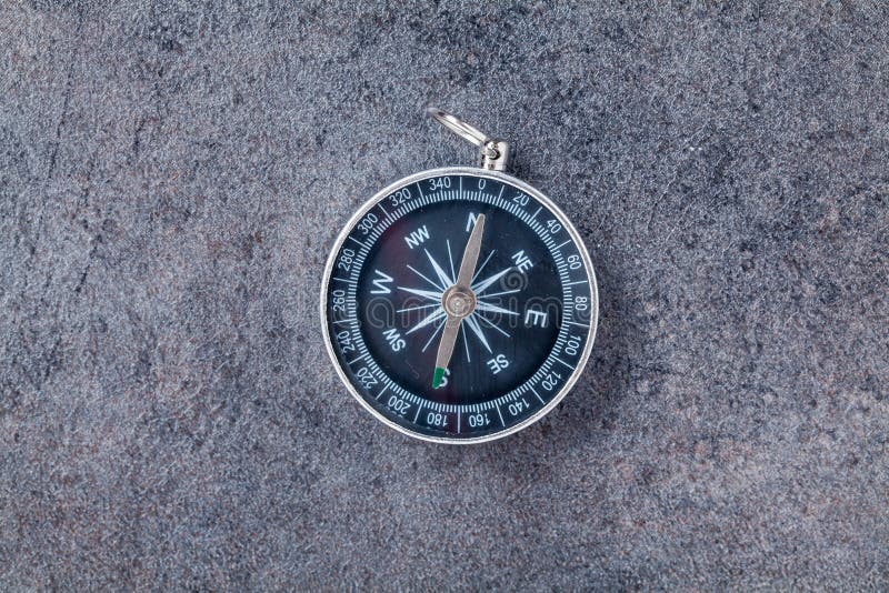 Compass on table stock image. Image of guide, golden - 108331837