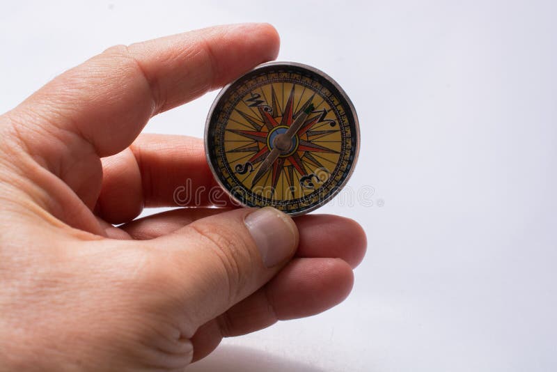 Compass Tool in Hand before a Model House Stock Image - Image of travel ...