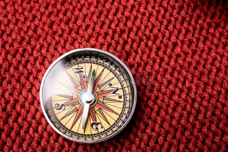 Compass Tool on Red Texture Stock Photo - Image of east, traveler ...