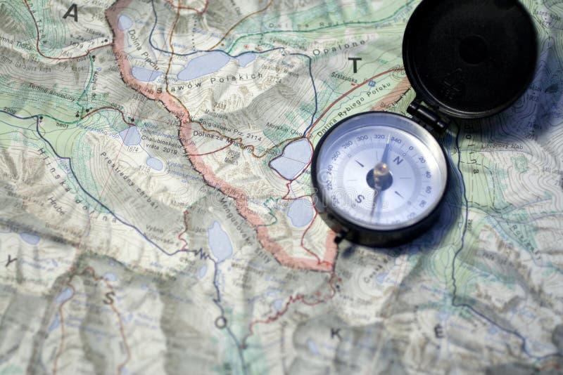 Compass on a Topographic Map Stock Image - Image of background ...
