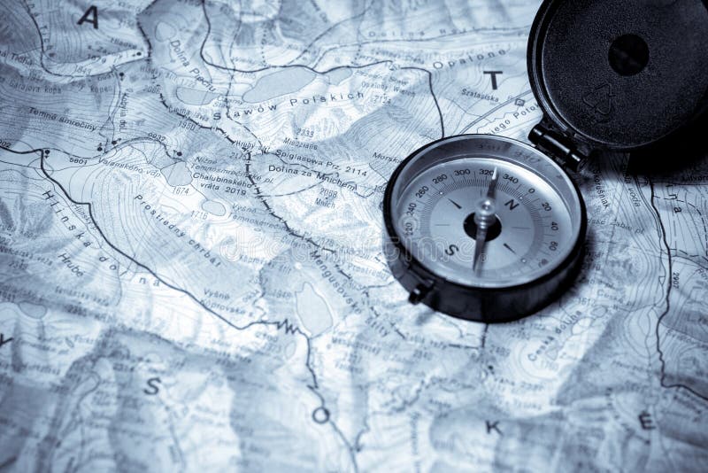 Compass on a Topographic Map Stock Image - Image of coordinate, journey ...