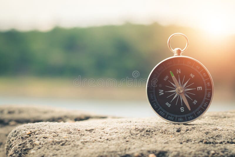 Compass of Tourists on Mountain at Sunset Sky Stock Image - Image of ...