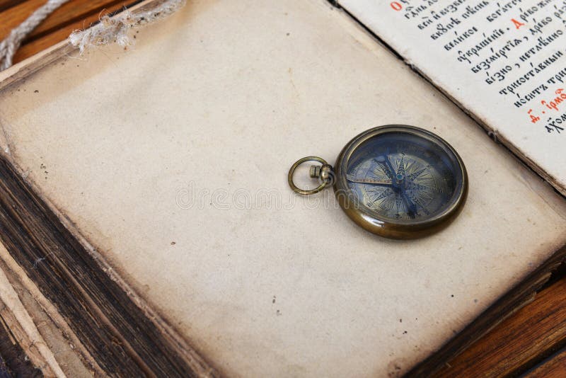 Compass and Watch on Old Book Stock Image - Image of ancient, object ...