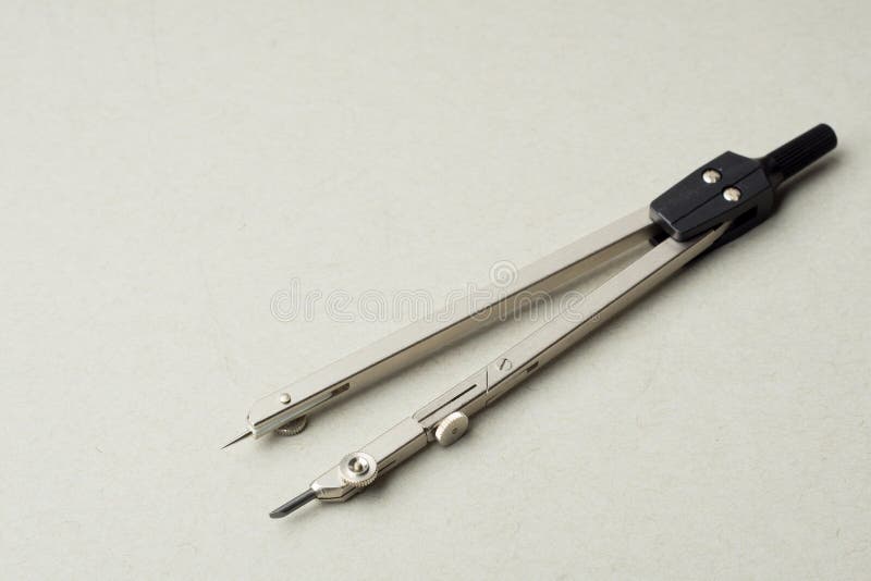 Compass on a White Background. Drawing Tools. Close-up Stock Image ...