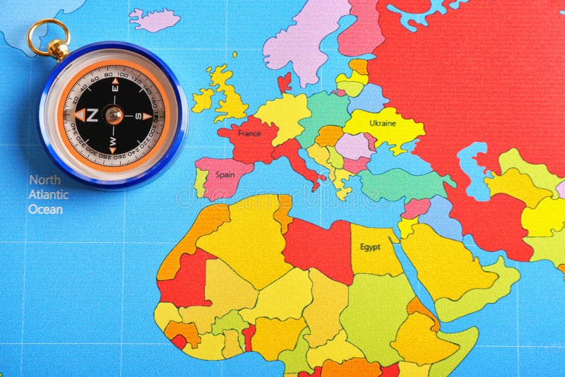Compass on world map stock photo. Image of journey, tourist - 150073160