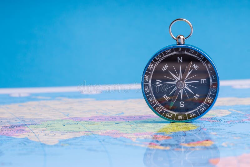 Compass on World Map Background Stock Image - Image of burnt, abstract ...