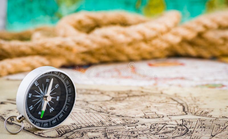 Compass on the world map stock photo. Image of needle - 187099298