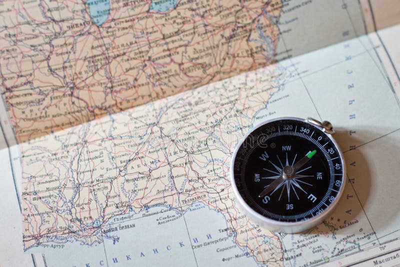 Compass on a world map stock image. Image of cartography - 92621363