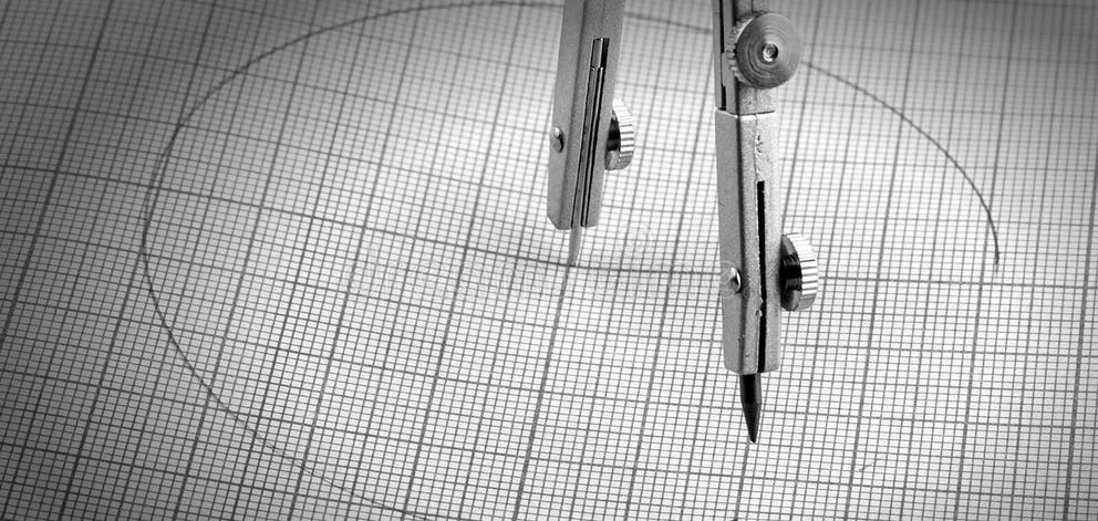 Compasses and a Circle Painted on Graph Paper Stock Photo - Image of ...