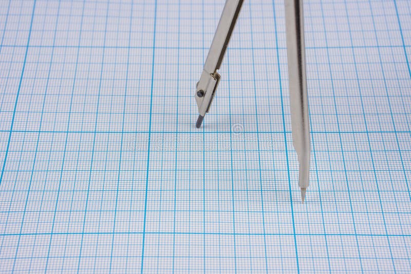 Compasses on graph paper stock image. Image of contour - 48989649