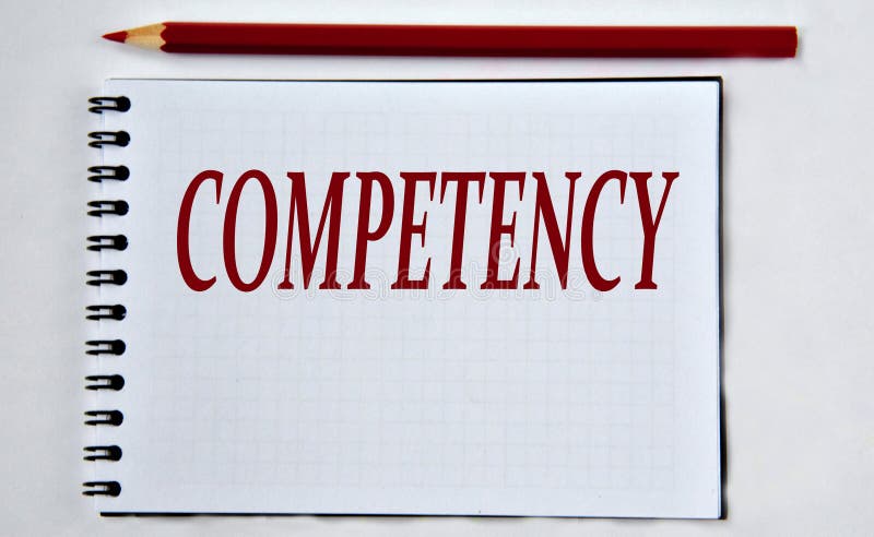 Competency Word Written on Wood Block. Competency Text on Table ...