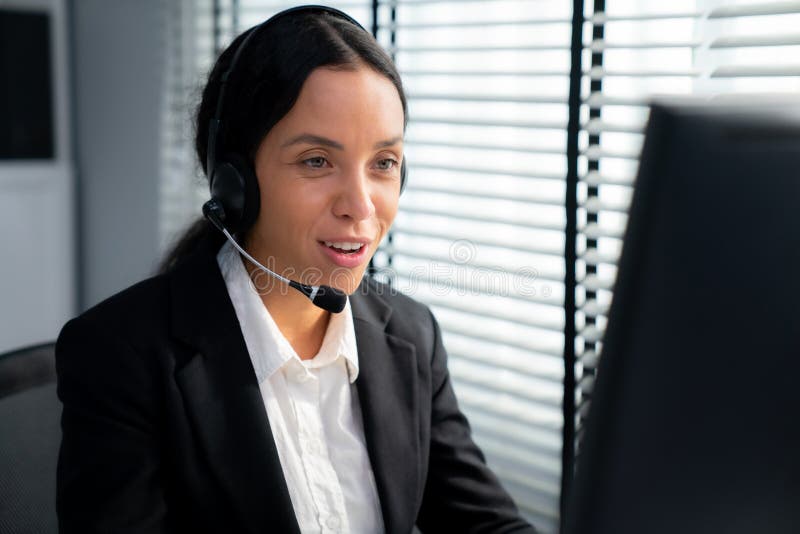 Competent Female Employee Working at Her Work Space with a Cup of ...