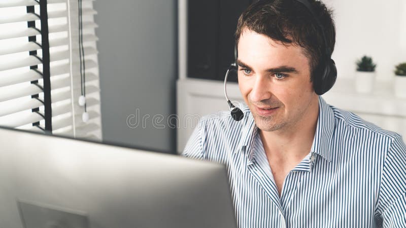 Competent Male Operator Working with Customers in the Office. Stock ...