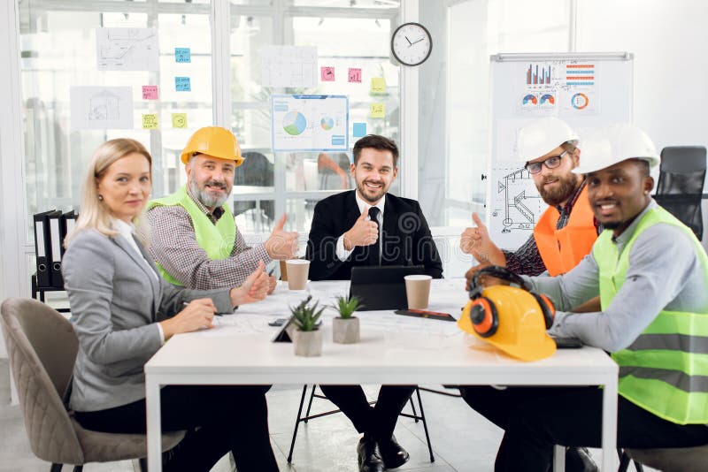 Competent Team Discussing Construction Project at Office Stock Image ...