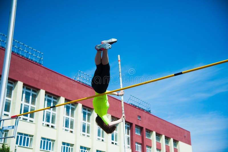 Competition Pole Vault Jumper Female Stock Photo - Image of motion ...