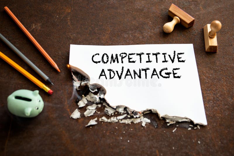 Competitive Advantage. Burning Sheet of Paper with Text on a Rusty ...