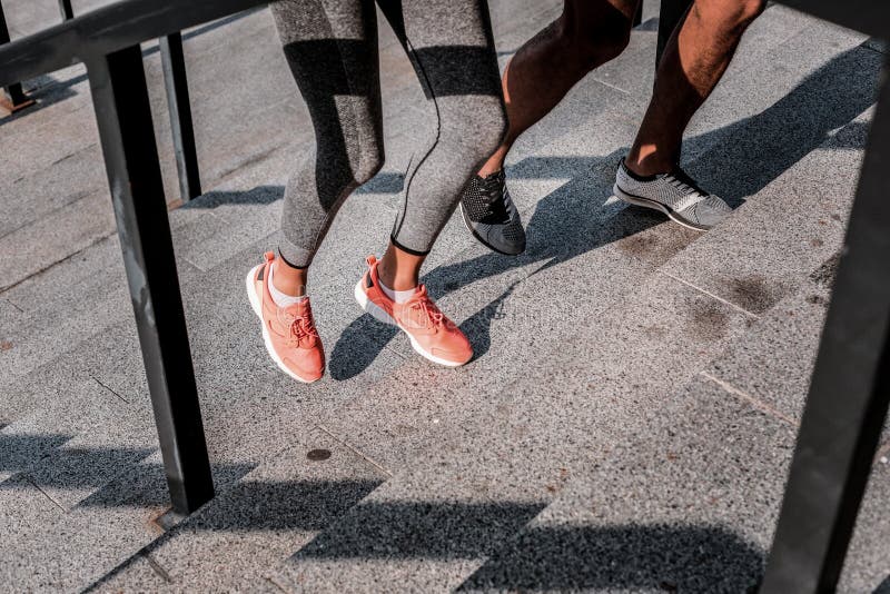 Legs of Young Professional Runners during the Workout Stock Photo ...