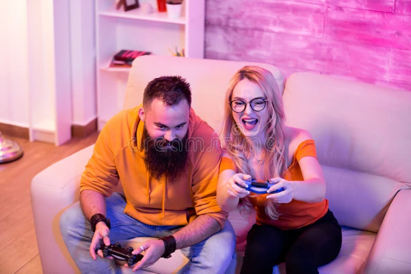 Competitive Couple Playing Video Games on Console Stock Image - Image ...