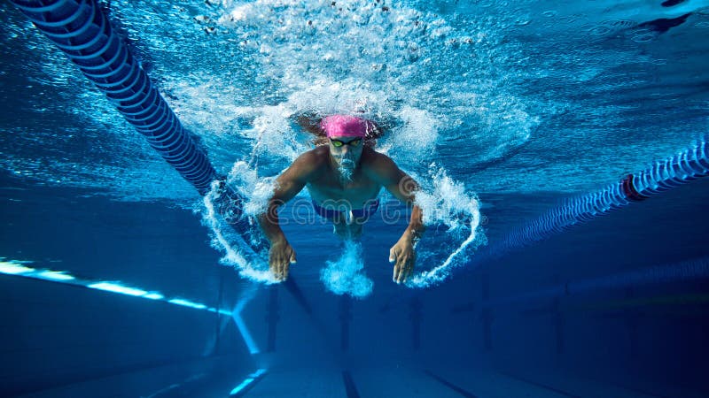 Competitive Swimmer, Man with Athletic Physique Captured Underwater ...