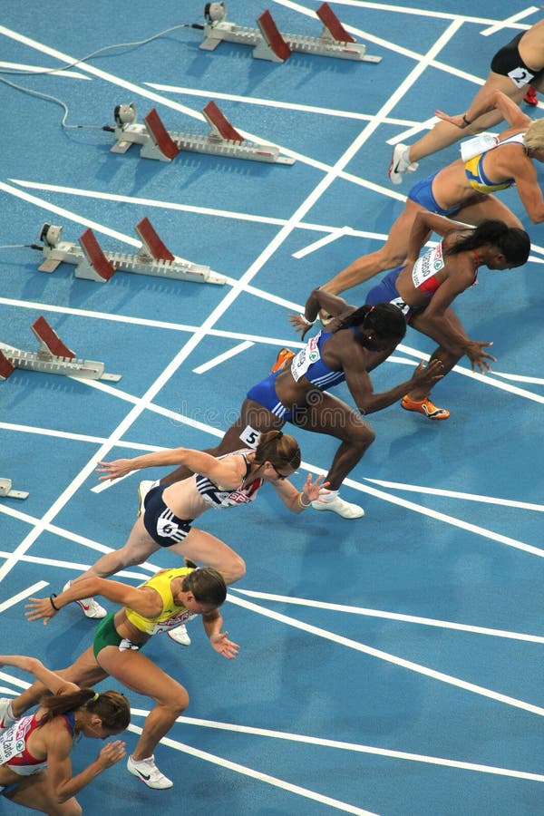 Competitors On Start Of 100m Editorial Photography - Image of track ...