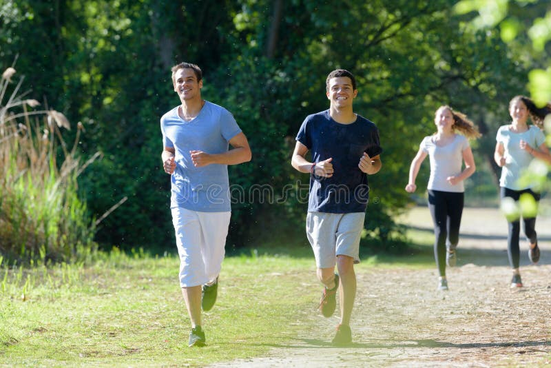 Competitors Running in Forest at Endurance Event Stock Photo - Image of ...