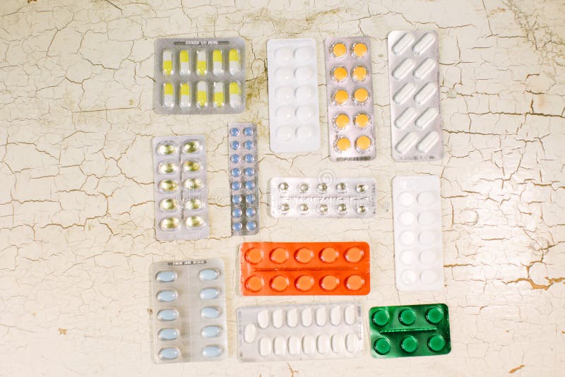 Compisition of Different Blister Packs of Tablets on Ancient White ...