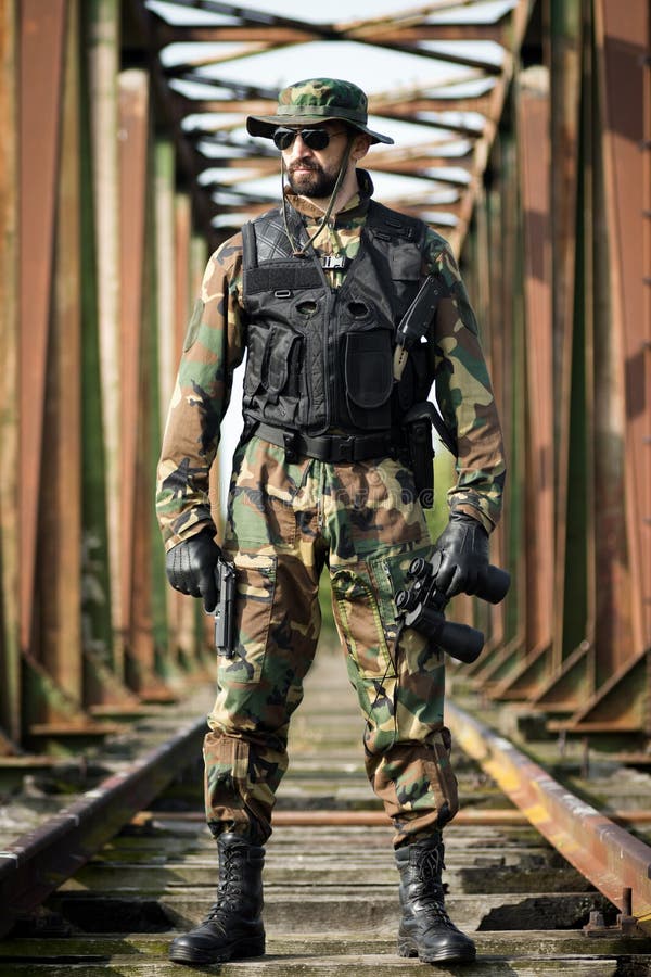 In Complete Military Uniform Stock Image - Image of handgun, bridge ...