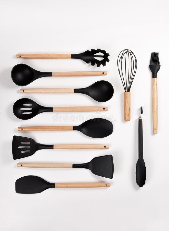 A Complete Set of Black Kitchen Utensils that Feature Wooden Handles ...