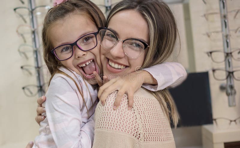 Head Shot Portrait Loving Daughter Hugging Mature Mother From Back