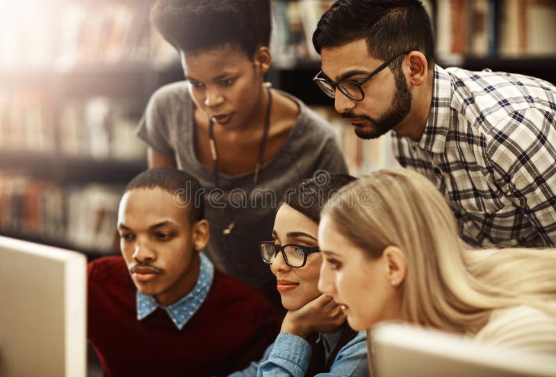 Completing Their Group Project Online. a Group of University Students ...
