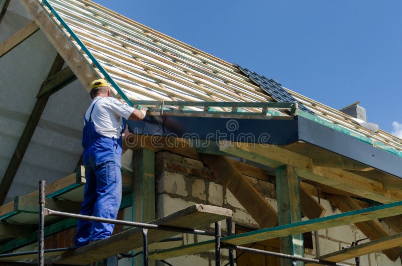 Completing work on a roof stock photo. Image of finishing - 50379916