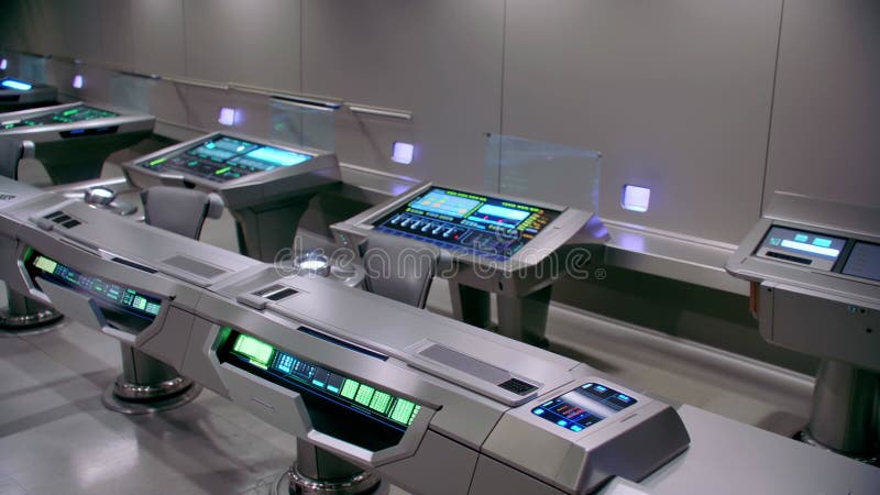 Complex Digital Interface in a Futuristic Control Room Displaying Changing Metrics and Data ...