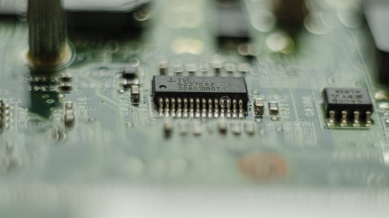 Complex Electronics, Green Circuit Board with a Microcontroller Stock ...