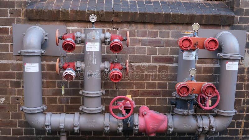 Complex Fire Hydrant Pipes, Valves and Switches, on Side of Commercial ...