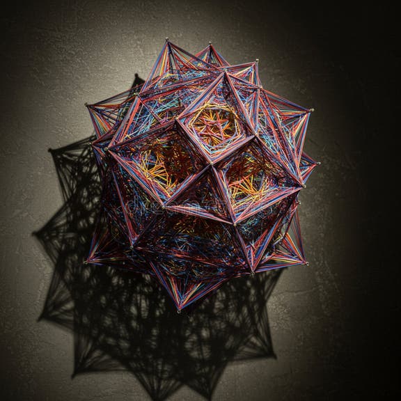 A Complex Geometric Sculpture Made of Colorful Threads Forms an ...