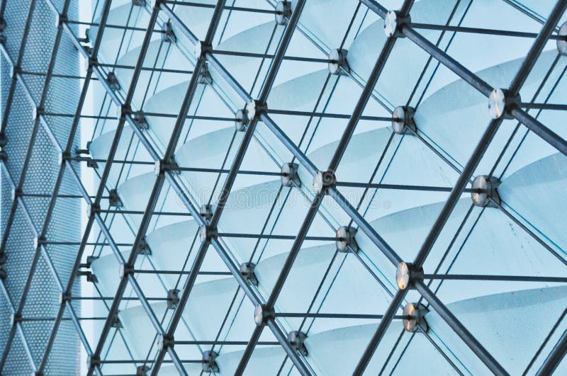 A Complex Geometric Structure Composed of Glass Panels and Metal Beams ...