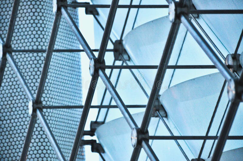 A Complex Geometric Structure Composed of Glass Panels and Metal Beams ...