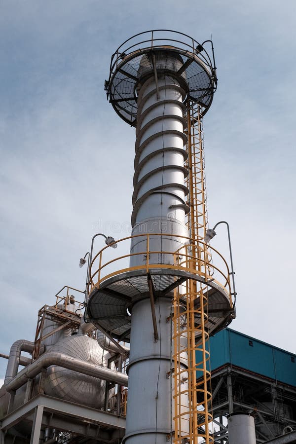 Complex Industrial Construction Featuring Metal Frameworks and a Tall ...