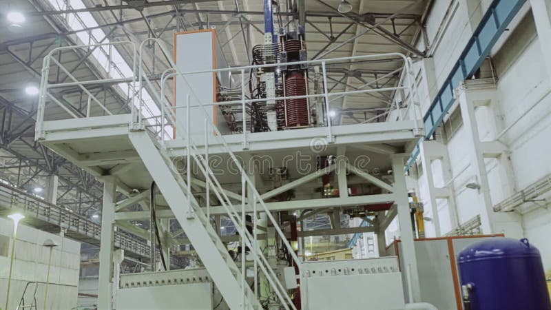 Complex Industrial Facility with Storage Silos and Piping System. a ...