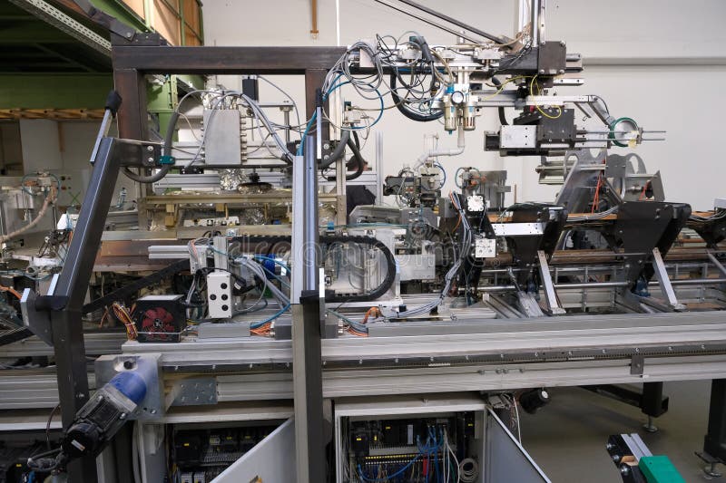 A Complex Machine Stands in a Factory Hall Stock Photo - Image of floor ...