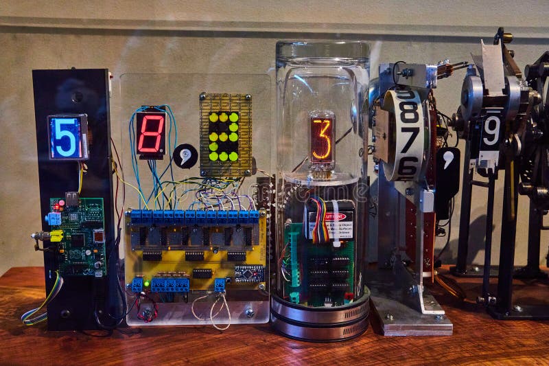 Complex Mechanical Timer with Varying Rotating Numbers Counting Upward ...